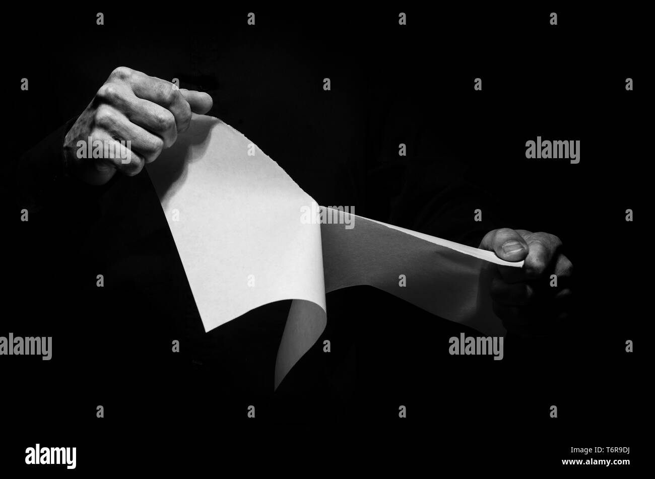 Tearing paper hi-res stock photography and images - Alamy