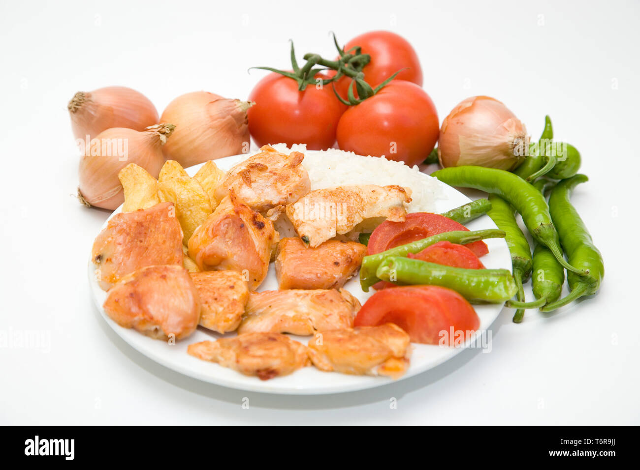 turkish style chicken fillet kebab with rice and salads Stock Photo - Alamy
