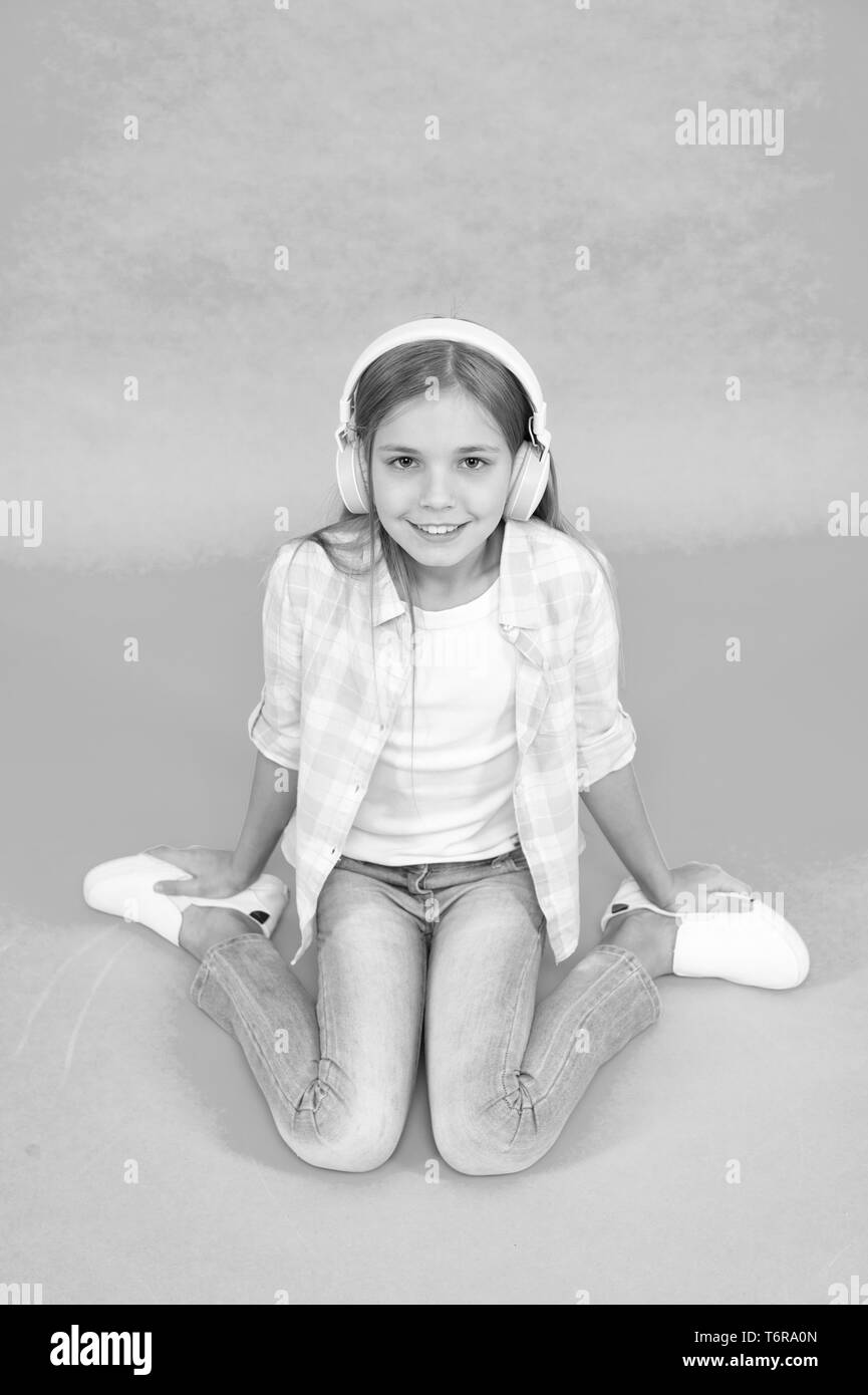 Music always with me. Leisure concept. Little girl listen song ...