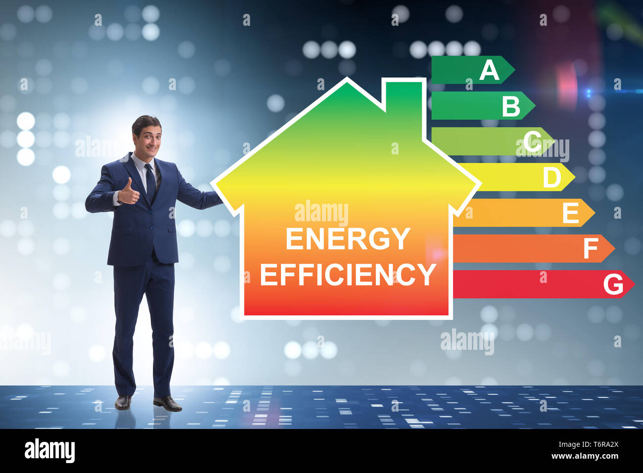 Businessman in energy efficiency concept Stock Photo - Alamy