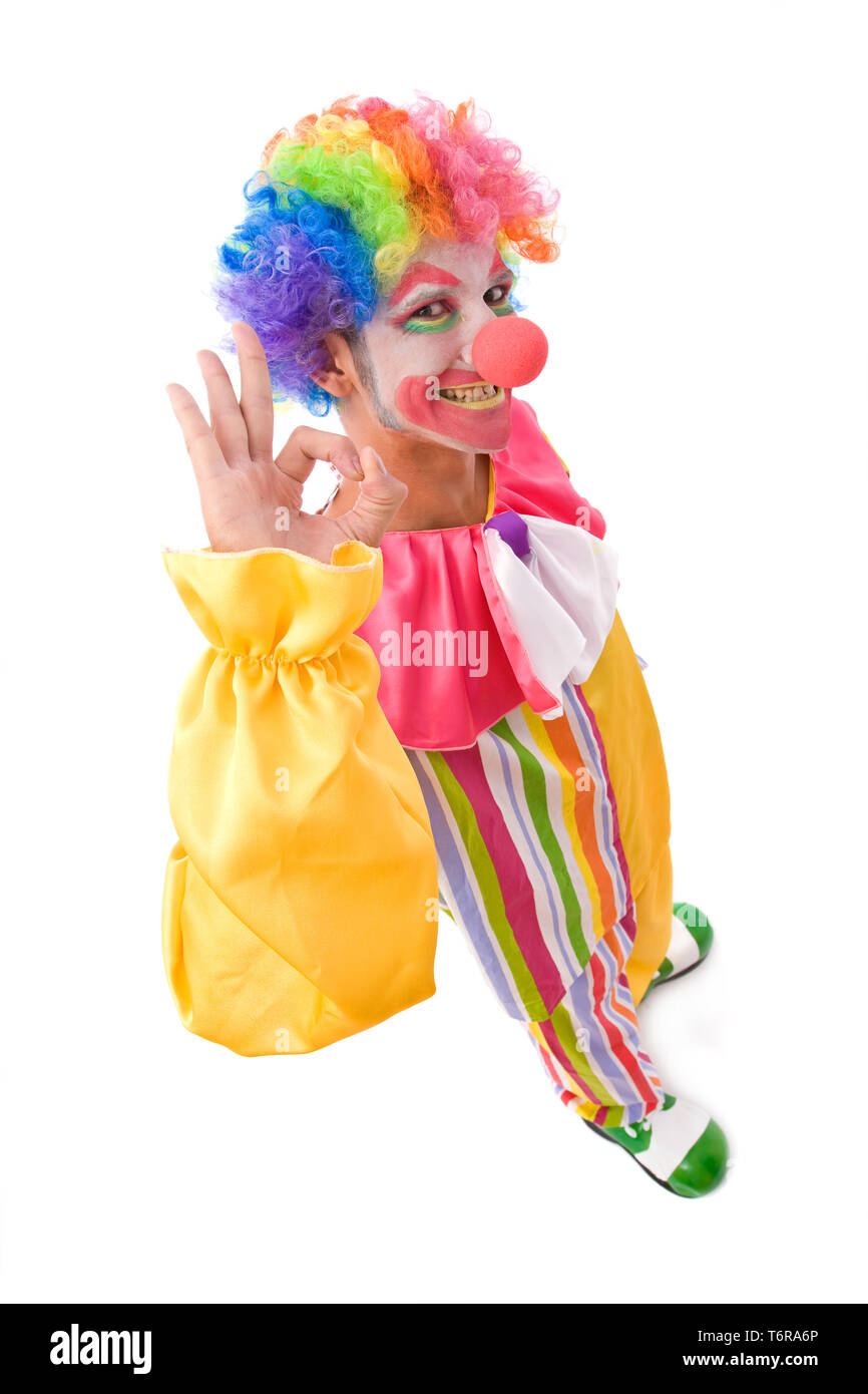 funny looking clorful clown making faces on white background Stock ...