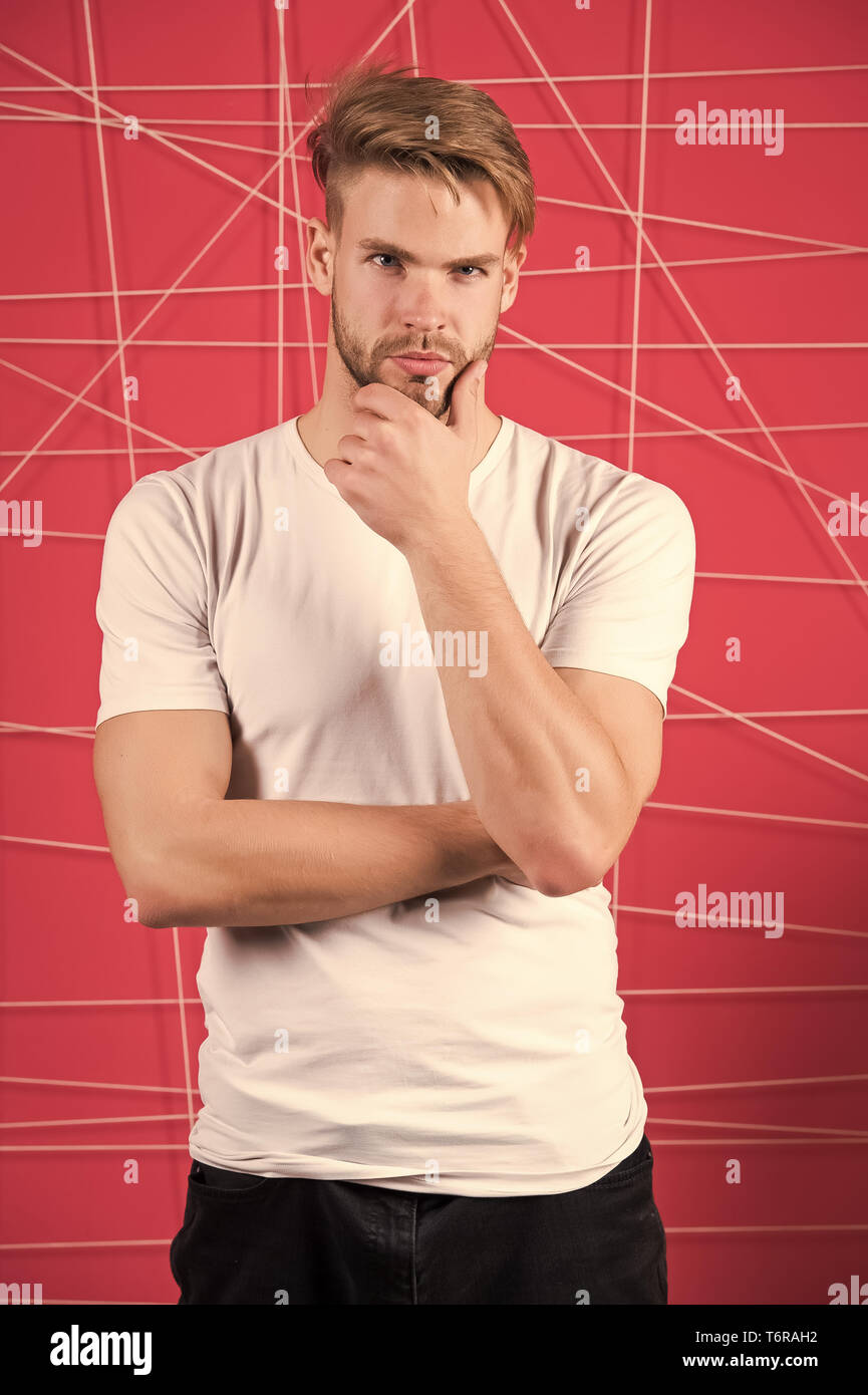 Man bearded thoughtful touch beard hand. Man stylish hair and healthy ...