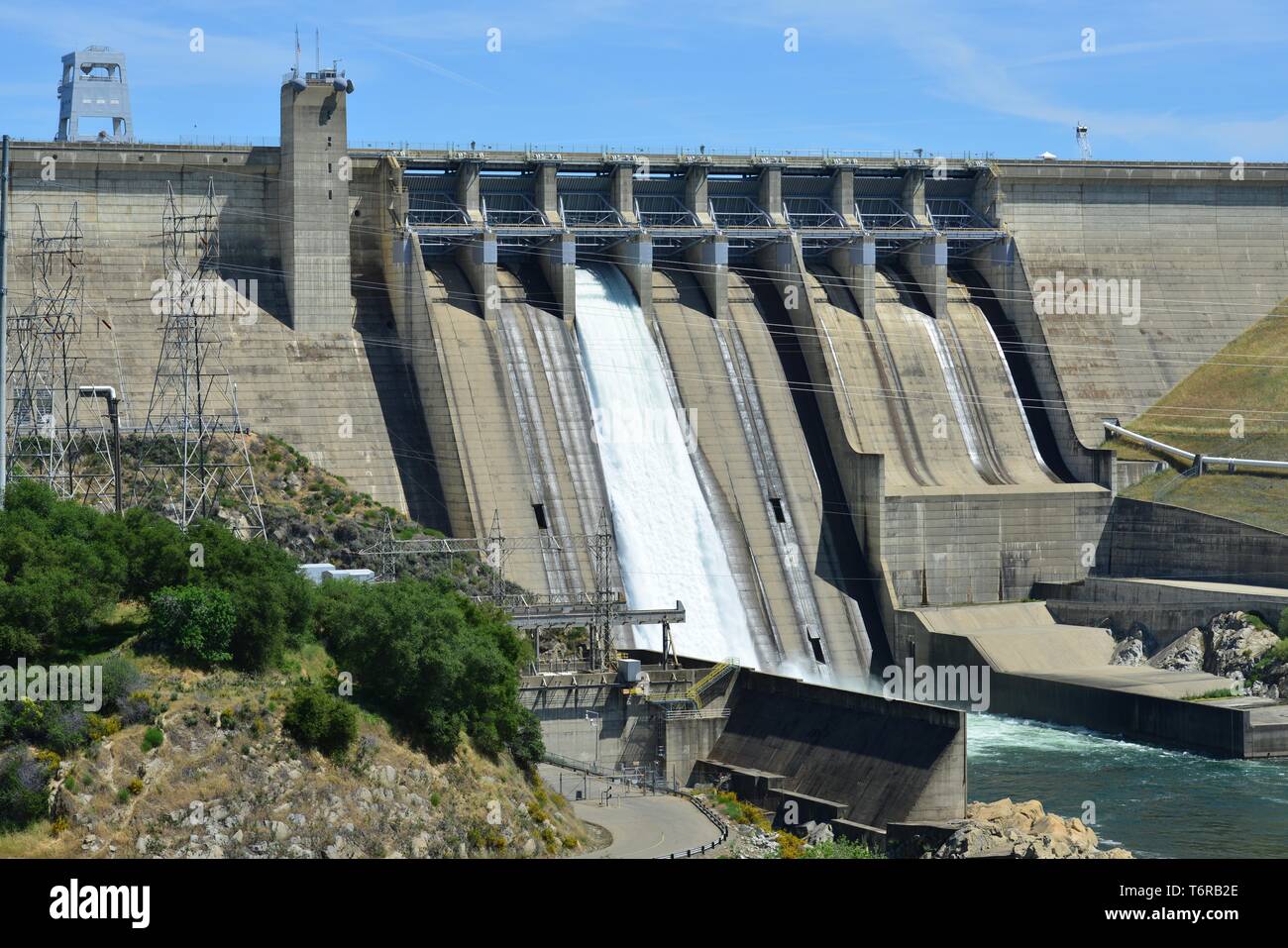Folsom Dam in California with a sluice gate open Stock Photo - Alamy