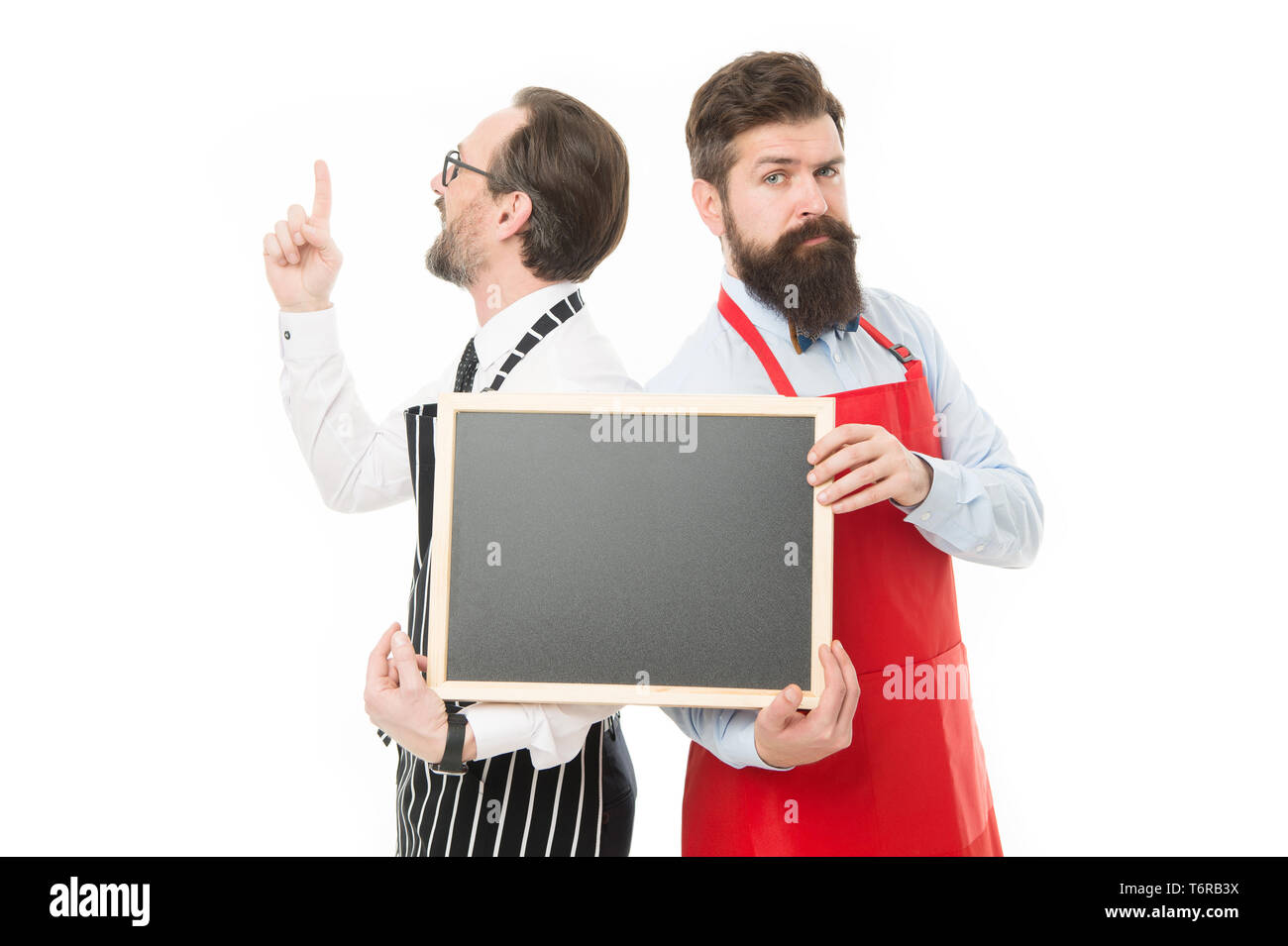 Men bearded bartender in apron hold blank chalkboard. Bartender with ...