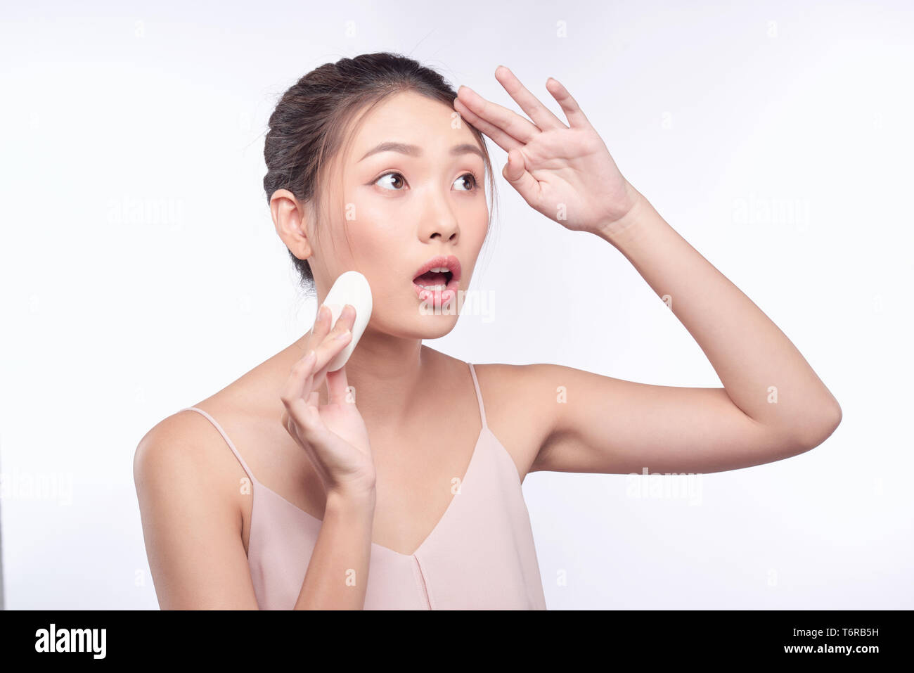 natural beautiful woman with powder puff on white background Stock ...