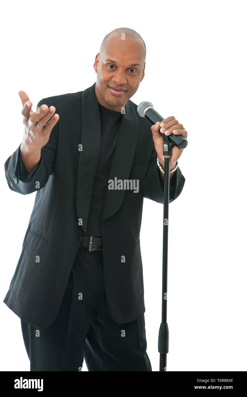 African American singer standing on a white background Stock Photo - Alamy
