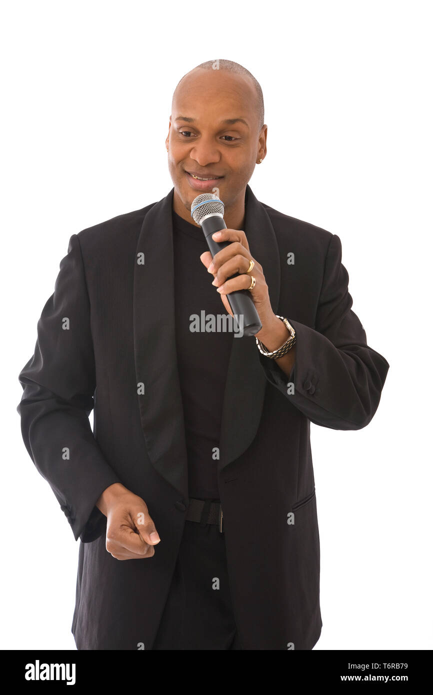 Handsome african american singer with microphone on white Stock Photo ...