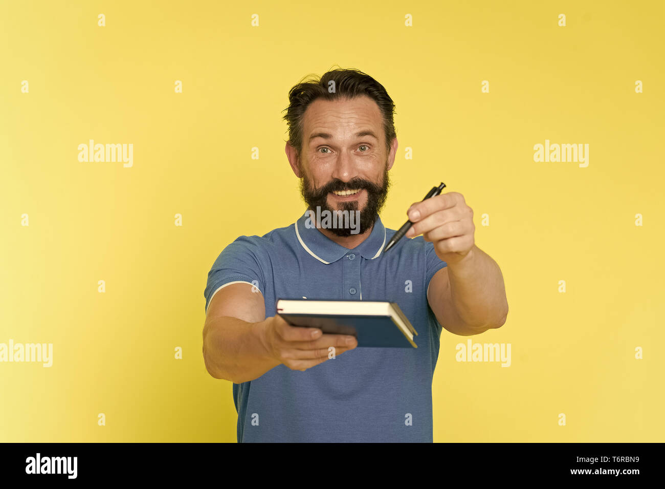 Signing concept. Happy man offer signing paper document. Book signing ...