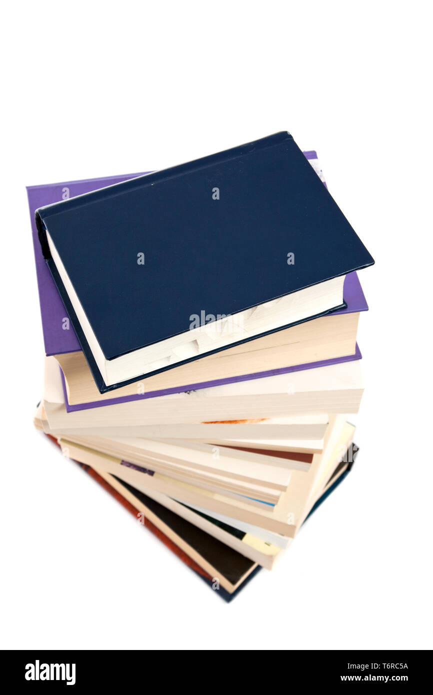 lots of books with colorful covers on white background Stock Photo - Alamy