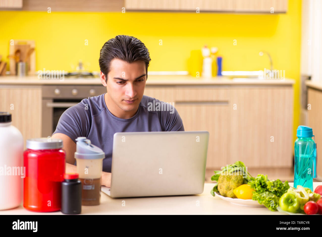 Young man in healthy eating concept Stock Photo - Alamy