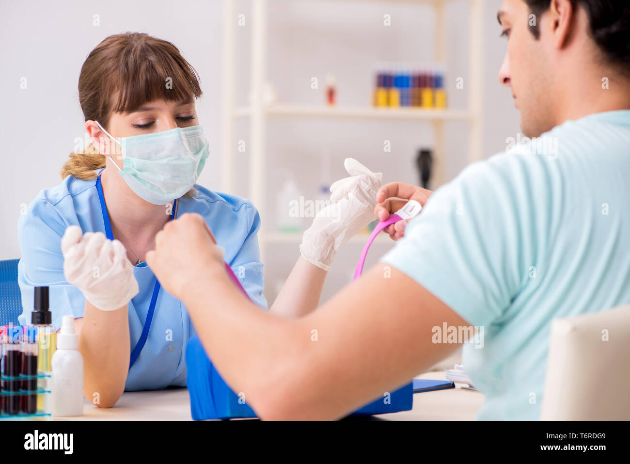 Young patient during blood test sampling procedure Stock Photo - Alamy