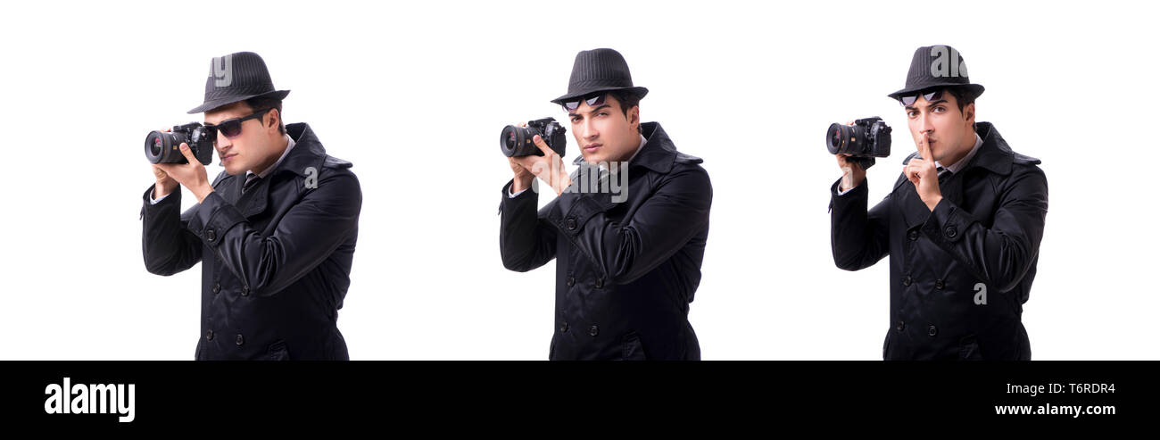 Spy with camera taking pictures isolated on white Stock Photo - Alamy