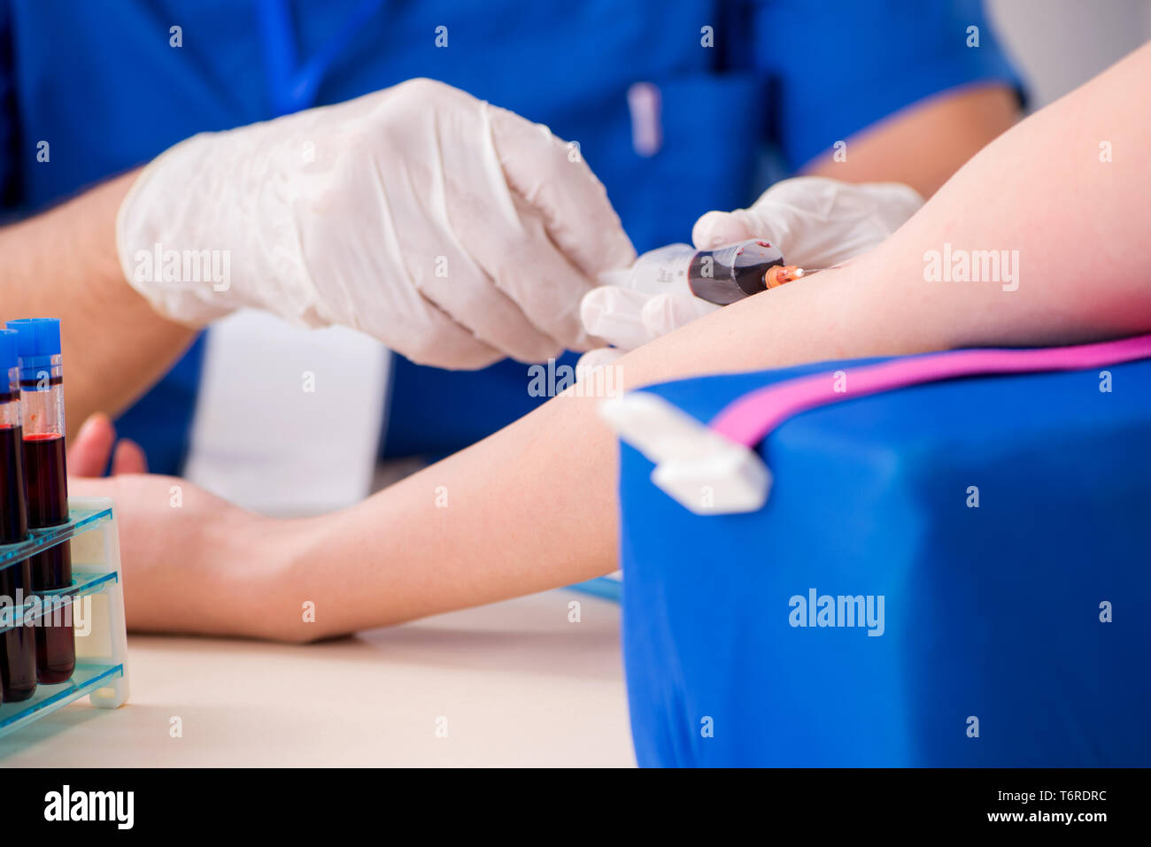 Young patient during blood test sampling procedure Stock Photo - Alamy