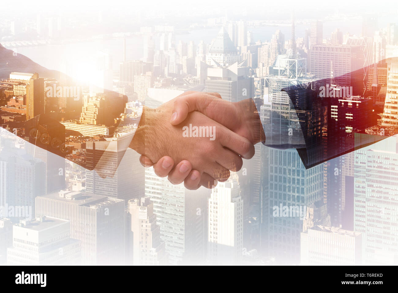 Concept of cooperation with handshake Stock Photo - Alamy
