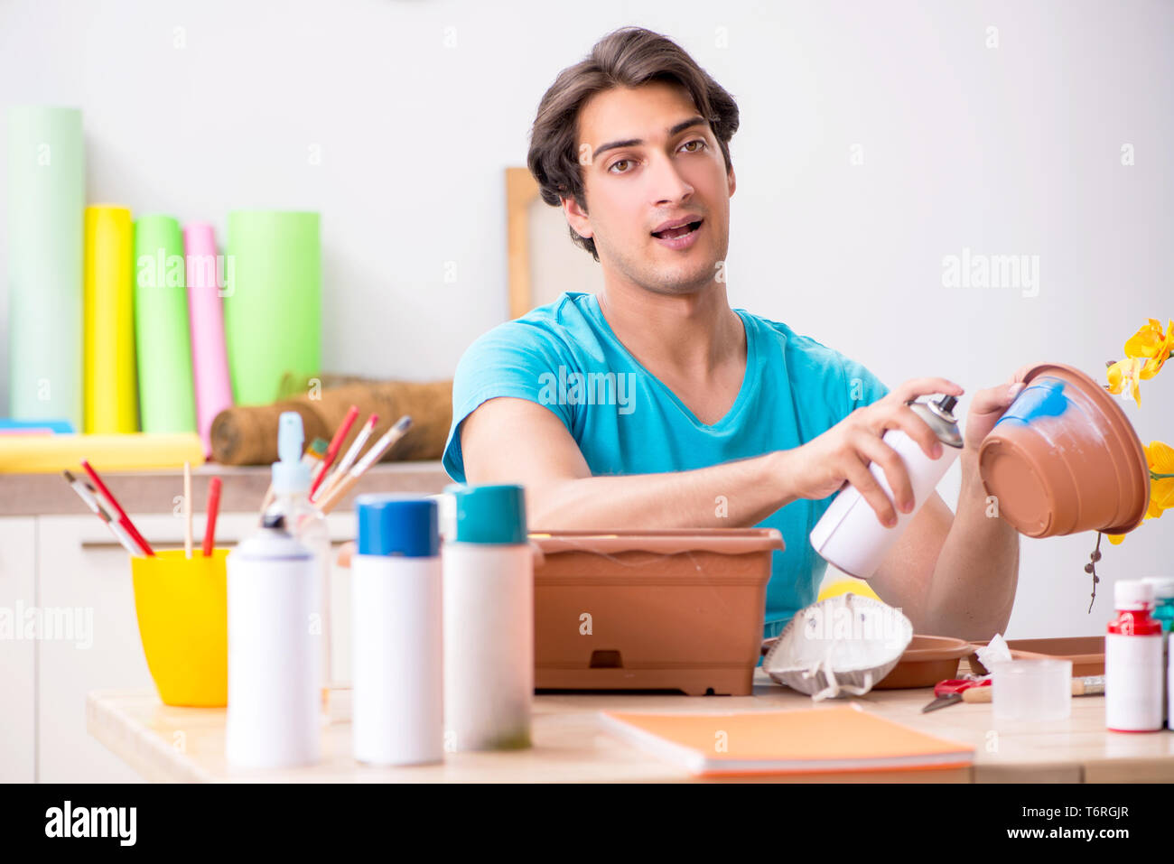 Man decorating pottery hi-res stock photography and images - Alamy