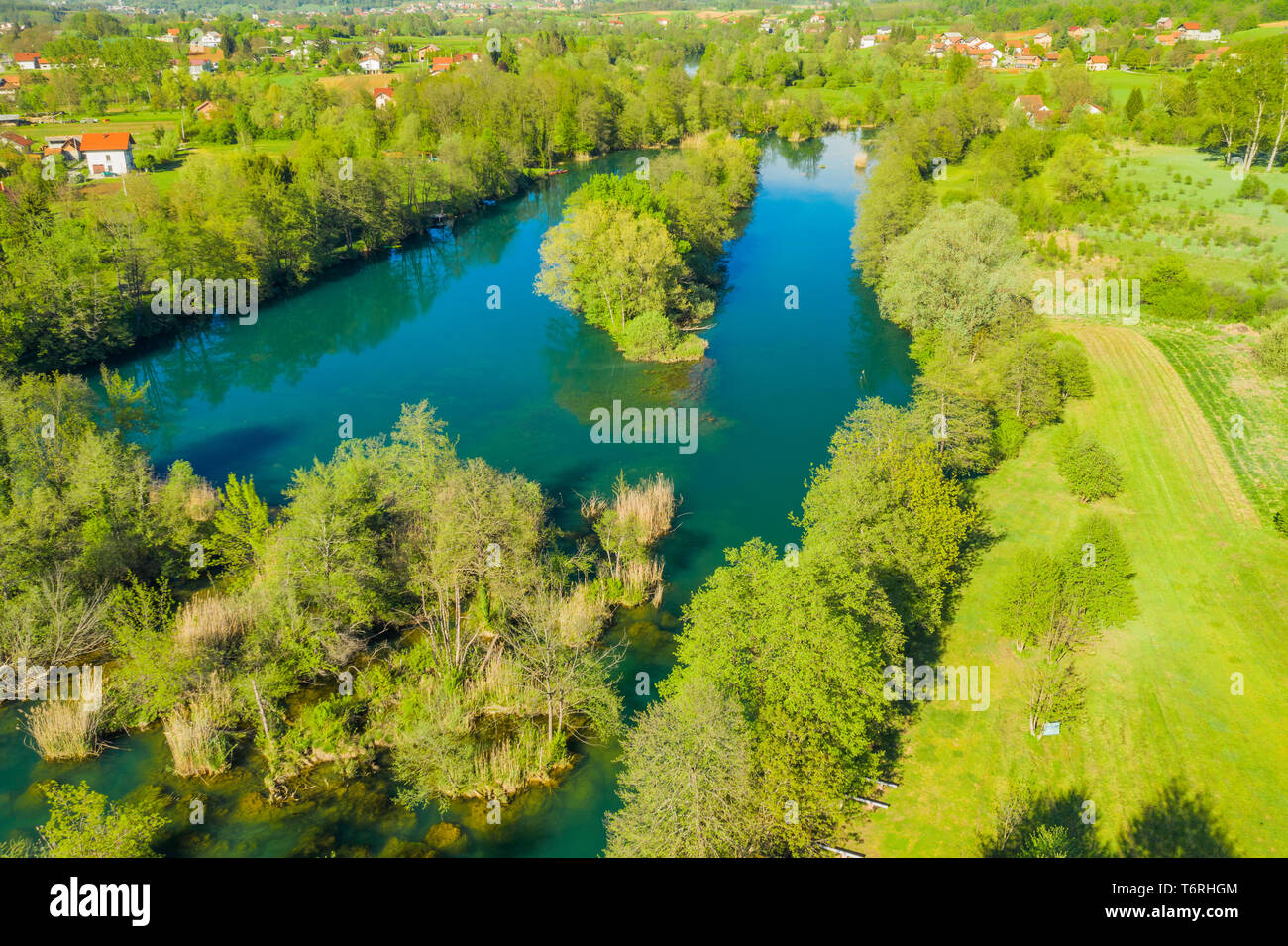 Beautiful rural landscape, Croatian river Mreznica and village of ...