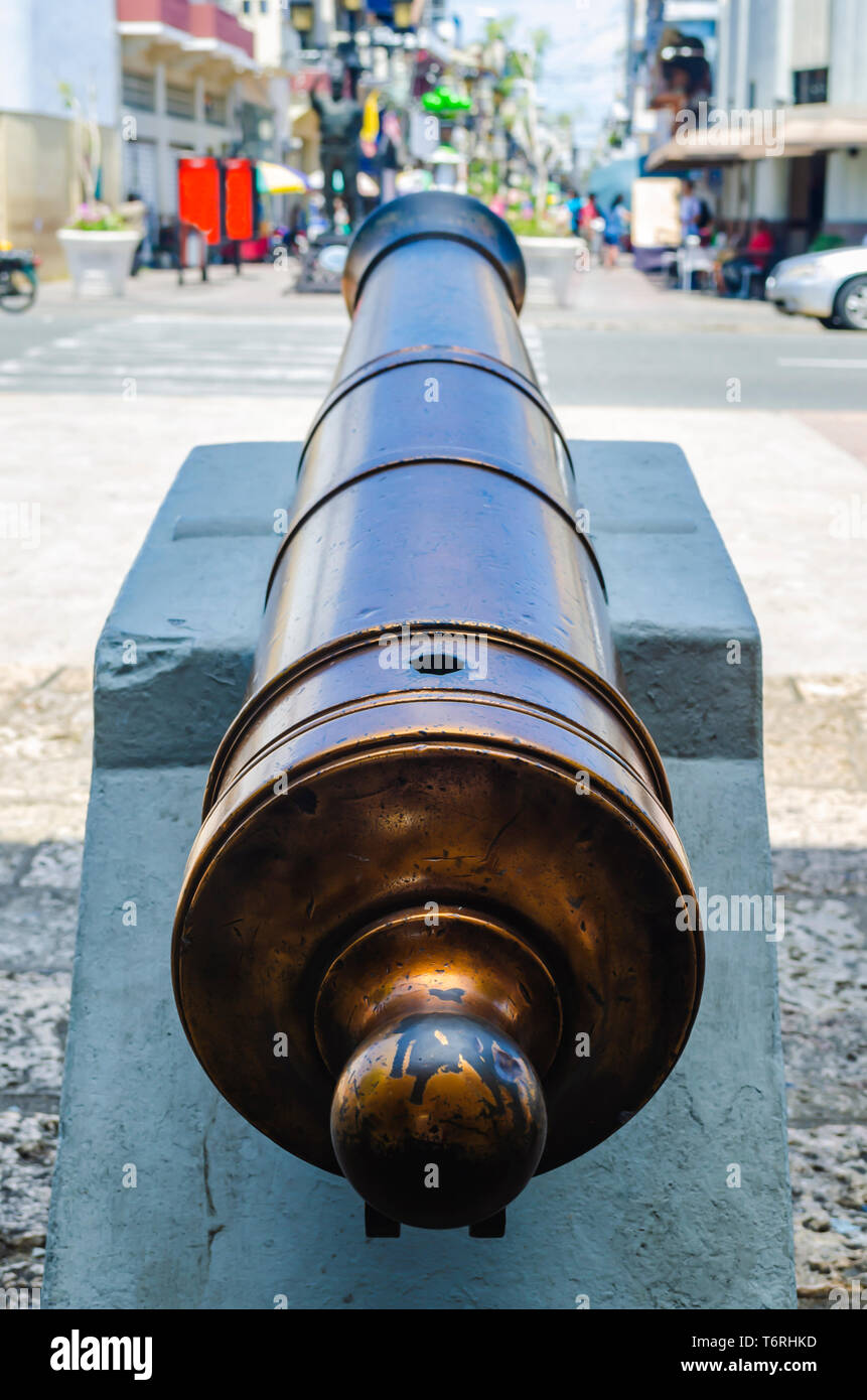 colonial cannon at the entrance of the Conde gate in the colonial zone ...