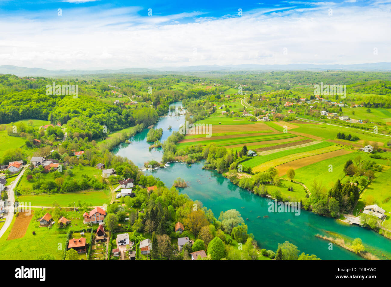 Beautiful rural landscape, Croatian river Mreznica and village of ...