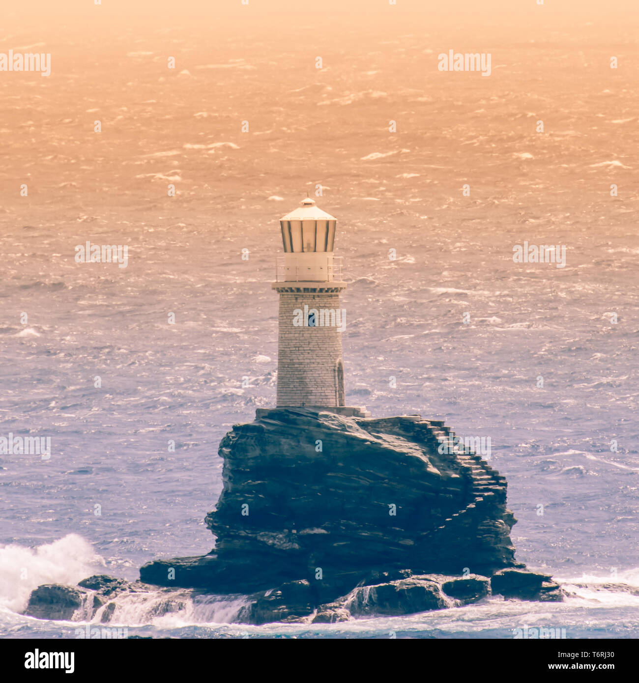 Lighthouse Tourlitis at Andros island in Greece Stock Photo - Alamy