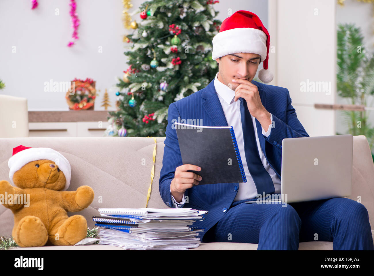 Busy employee working from home Stock Photo - Alamy