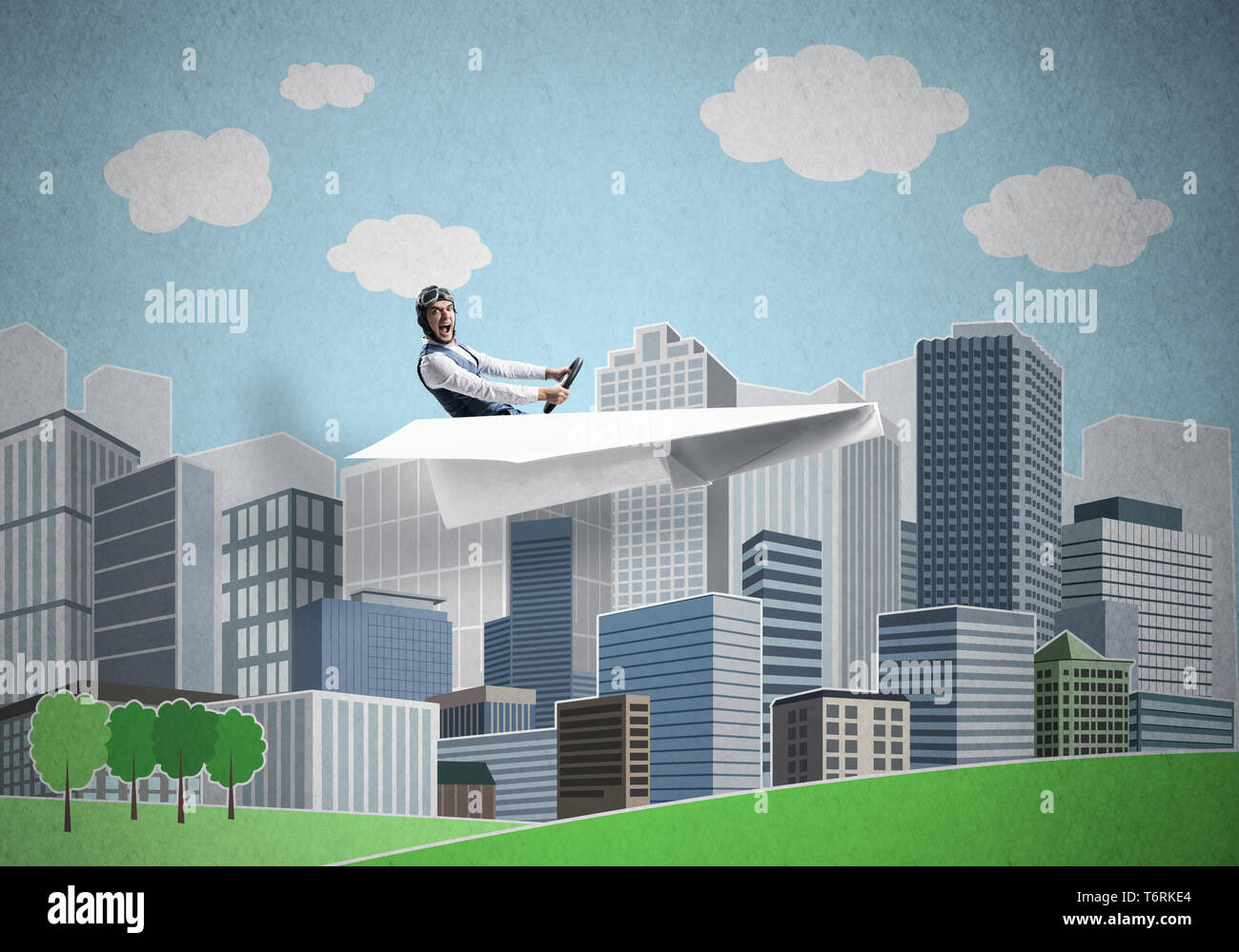 Aircraft pilot flying in paper plane Stock Photo - Alamy