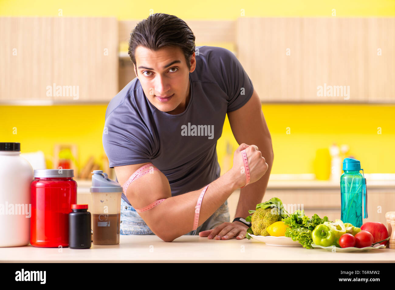 Young man in healthy eating concept Stock Photo - Alamy