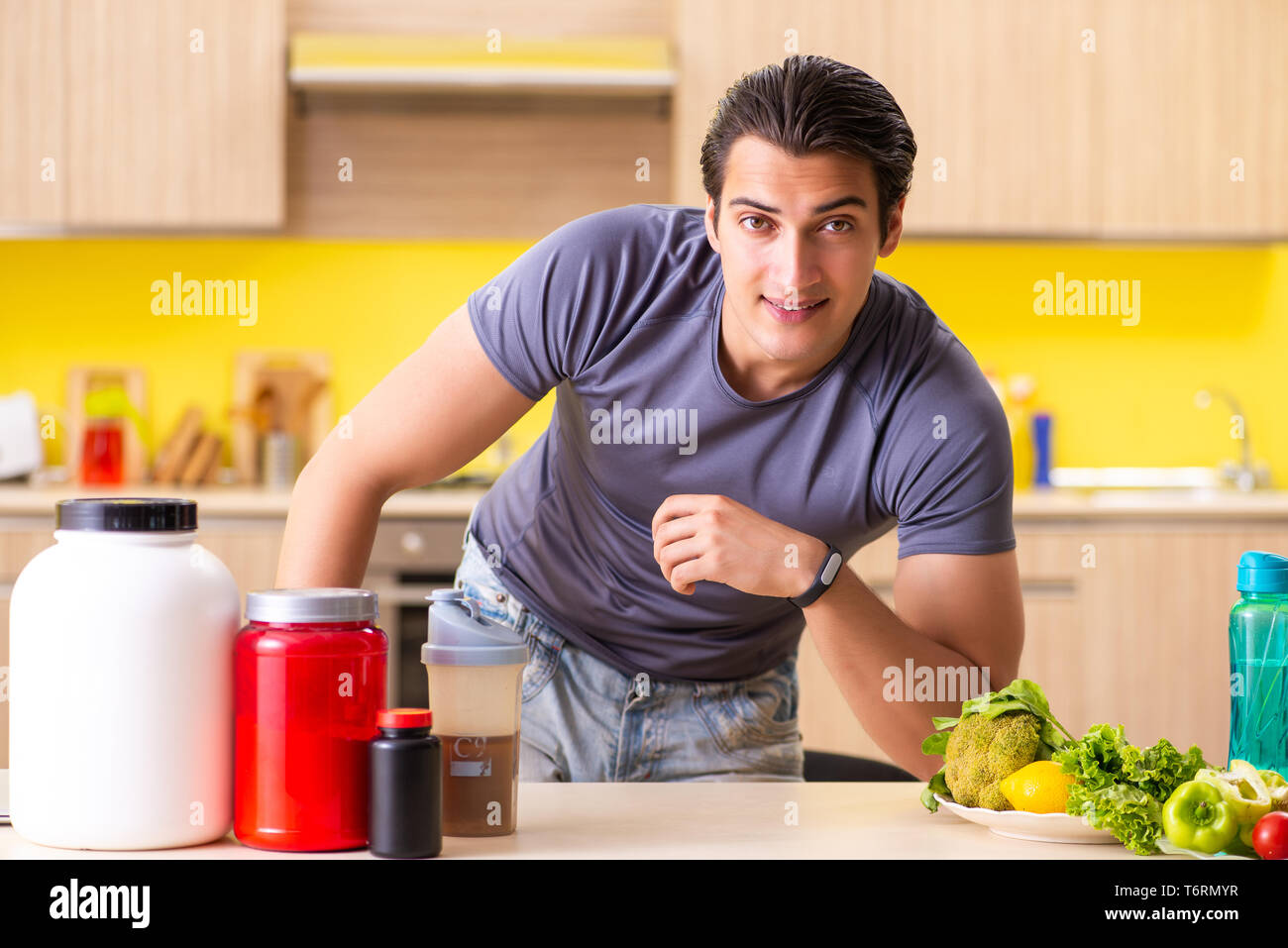 Young man in healthy eating concept Stock Photo - Alamy