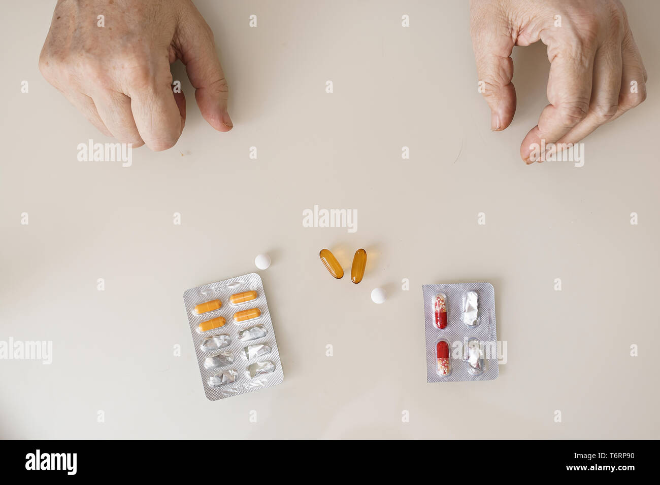 sport, healthy lifestyle, medicine, nutritional supplements and people concept - close up of ...