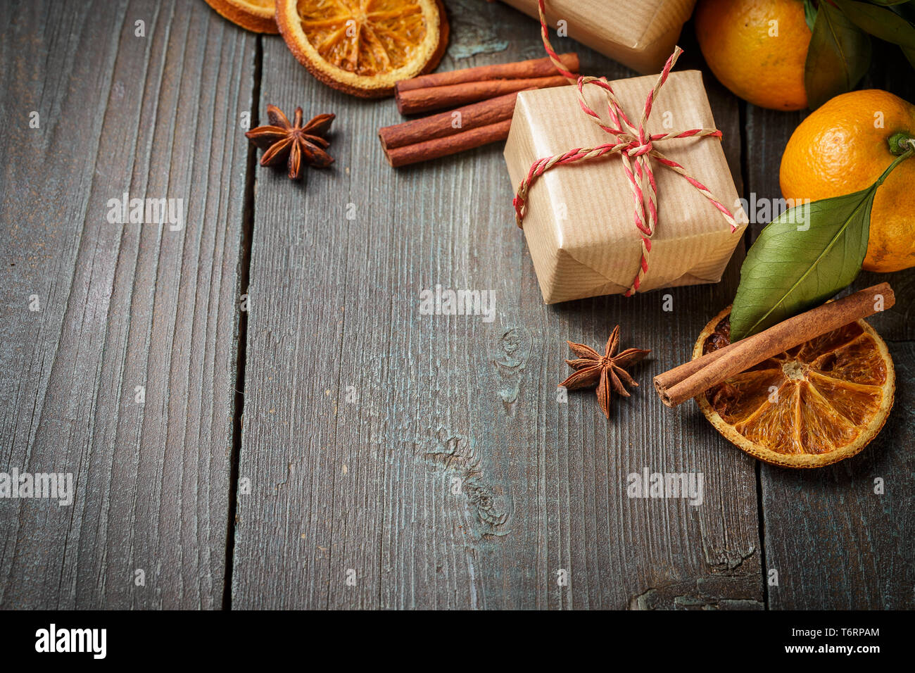Christmas decoration with gift box and mandarines Stock Photo - Alamy