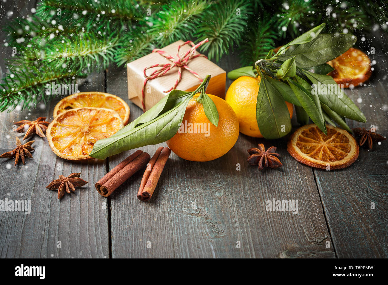 Christmas decoration with gift box and mandarines Stock Photo - Alamy