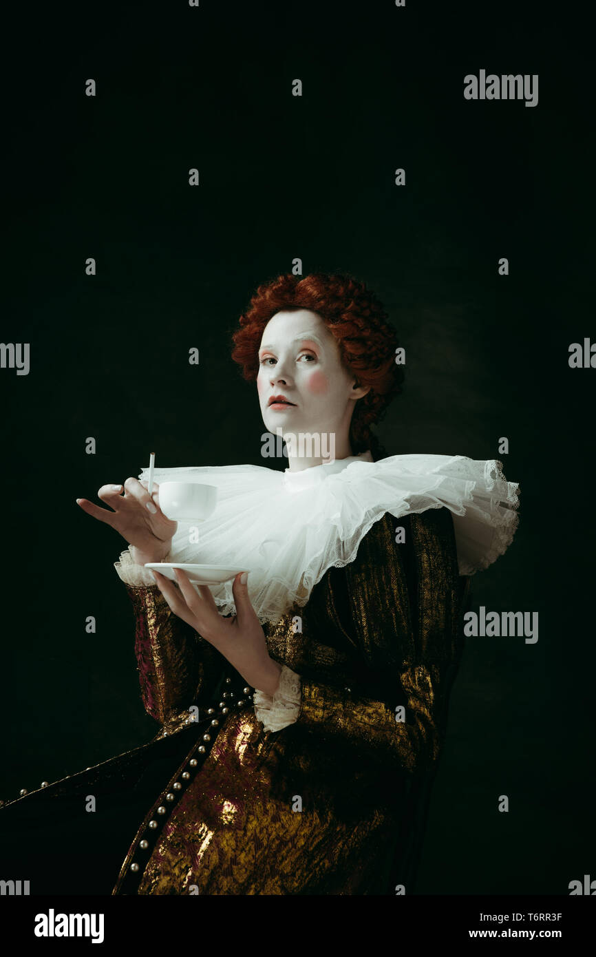 Beautiful redhead woman smoking cigarette hi-res stock photography and ...