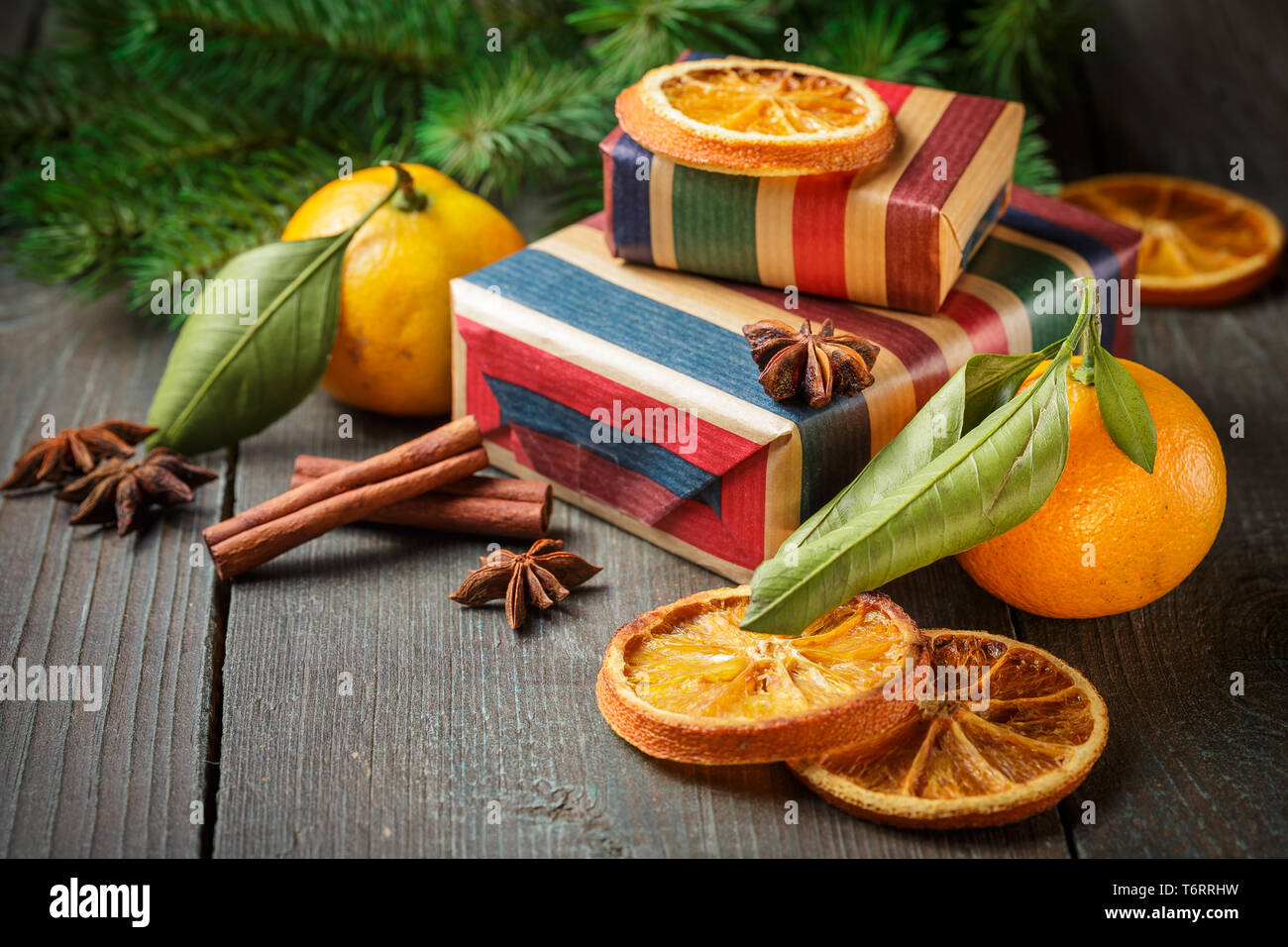 Christmas decoration with gift box and mandarines Stock Photo - Alamy