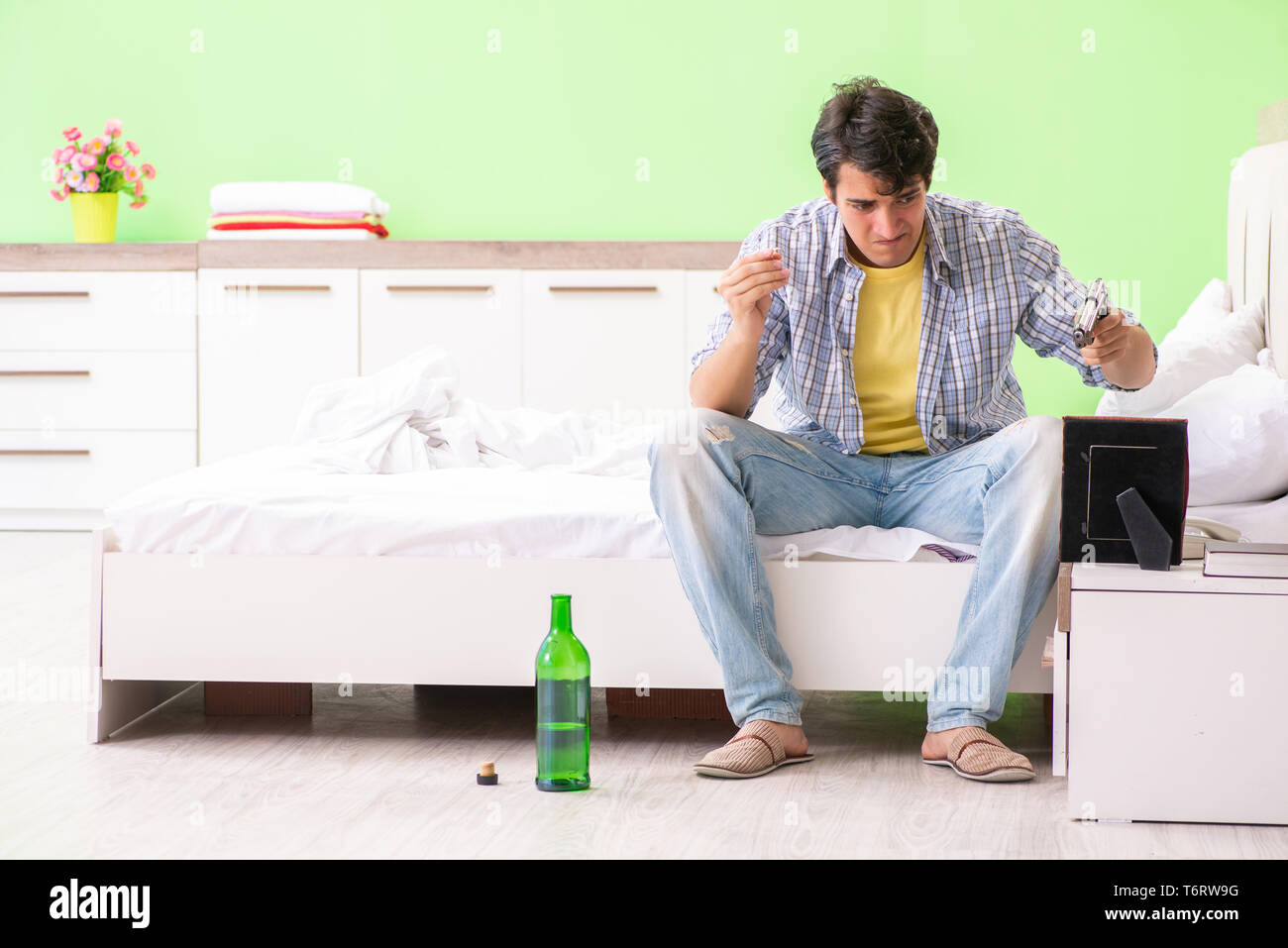 Young man sad in unhappy love concept Stock Photo - Alamy