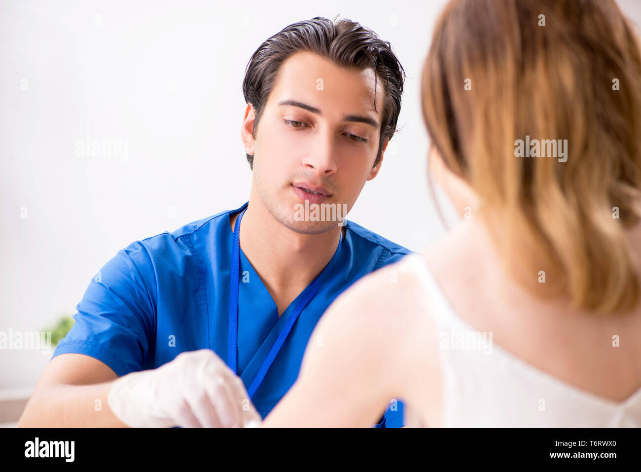 Nurse checking patient procedure hi-res stock photography and images ...