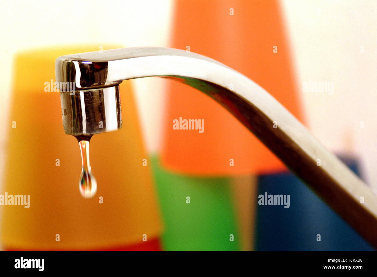 Faucet and waste of water Stock Photo - Alamy