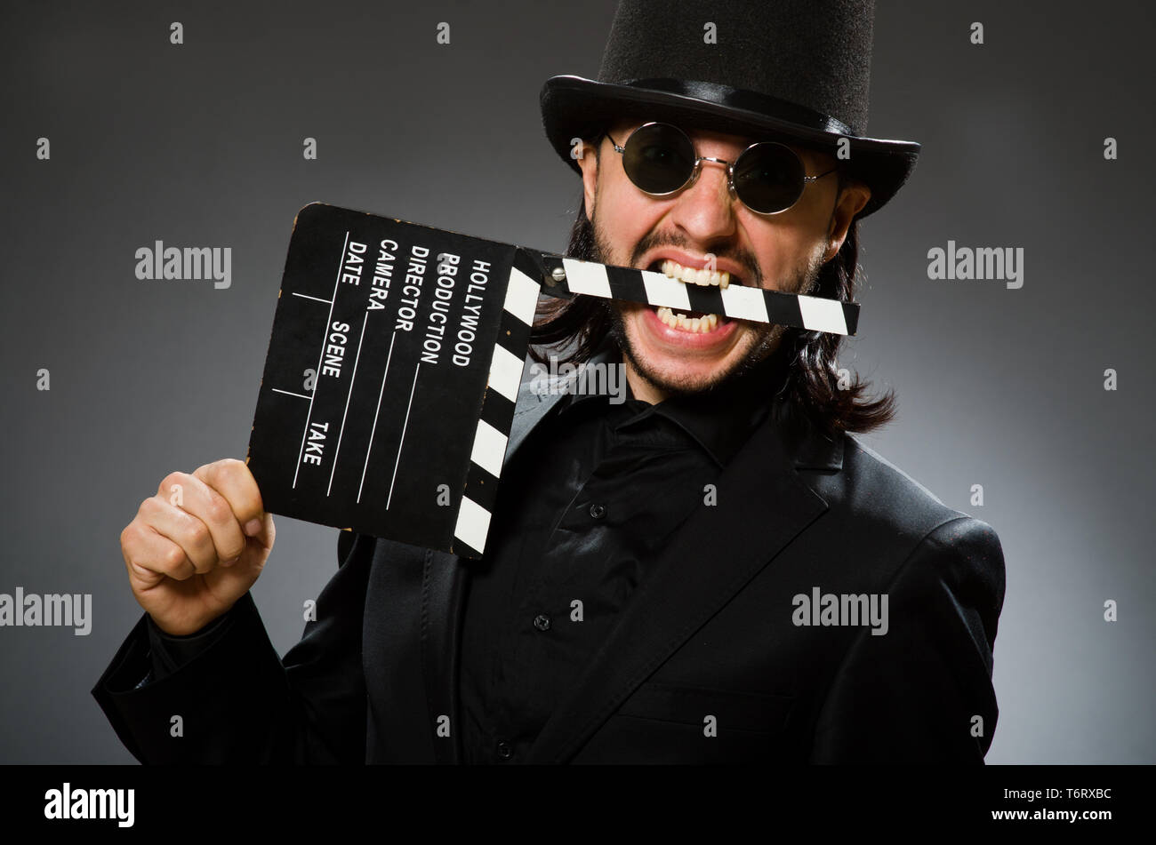 Vintage concept with man wearing black top hat Stock Photo - Alamy