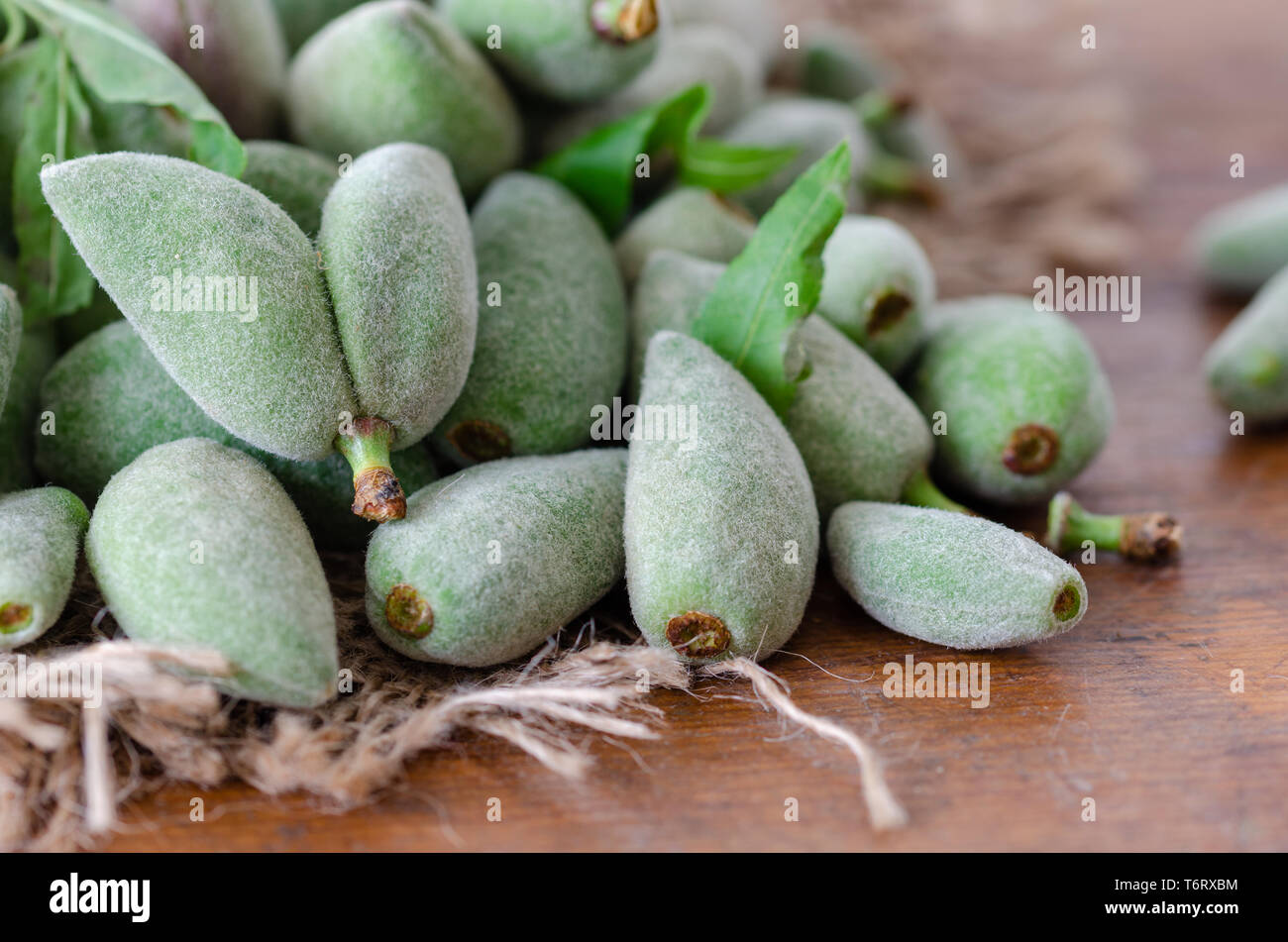 Stack of Fresh Green Almond Nut Fruits On Table İn The Kitchen Stock ...