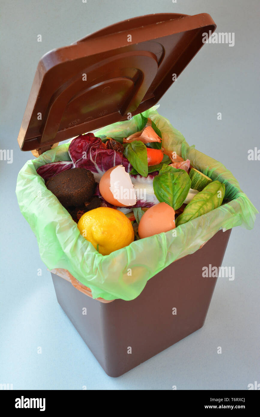 Trash bin full of organic garbage hi-res stock photography and images ...