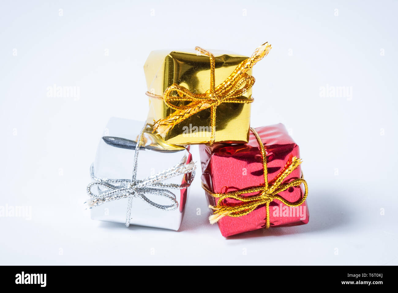 Decorative gifts on white background Stock Photo - Alamy