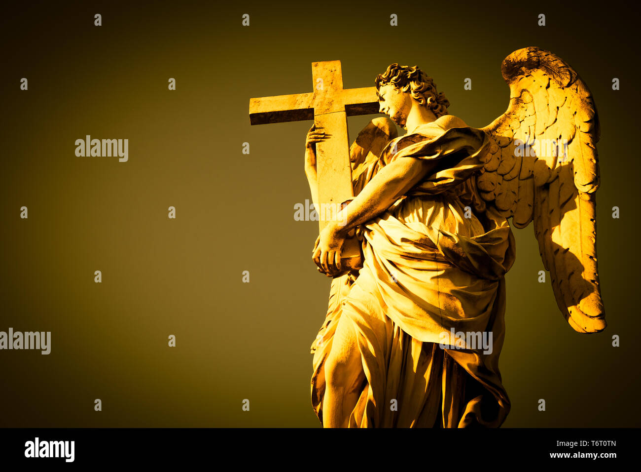 Catholic angel with cross Stock Photo - Alamy