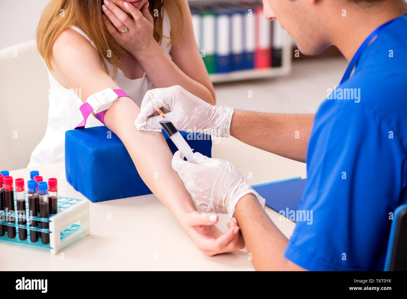 Young patient during blood test sampling procedure Stock Photo - Alamy
