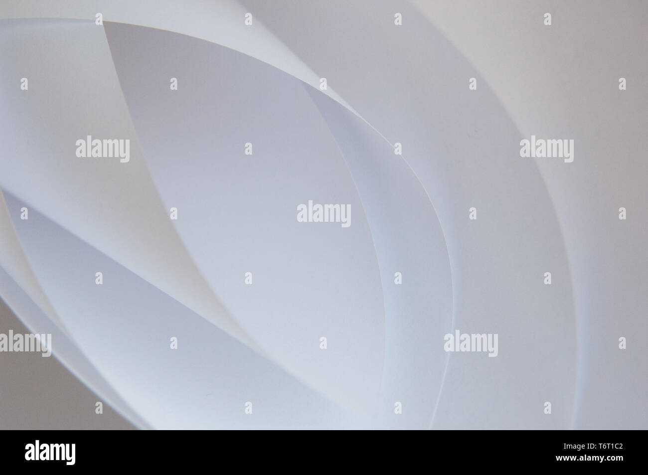 abstract background of a twisted sheet of white paper Stock Photo - Alamy