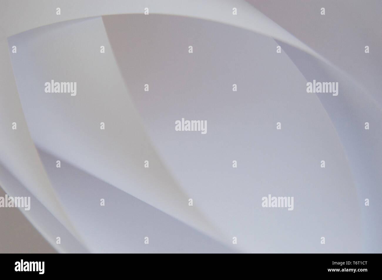 abstract background of a twisted sheet of white paper Stock Photo - Alamy