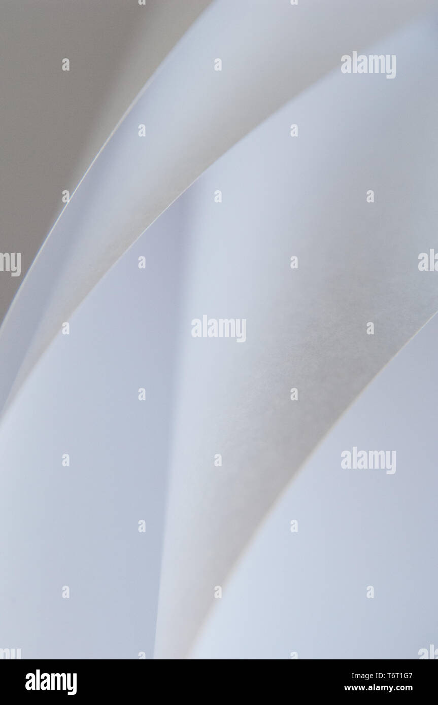 abstract background of a twisted sheet of white paper Stock Photo - Alamy