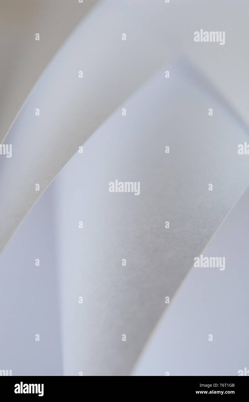 abstract background of a twisted sheet of white paper Stock Photo - Alamy