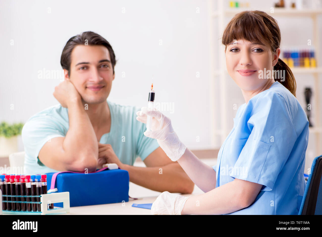 Young patient during blood test sampling procedure Stock Photo - Alamy