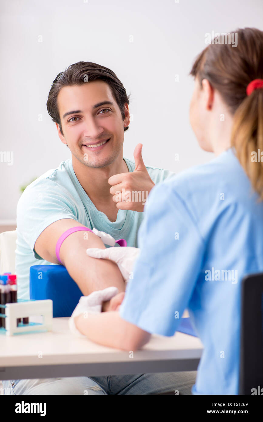 Young patient during blood test sampling procedure Stock Photo - Alamy