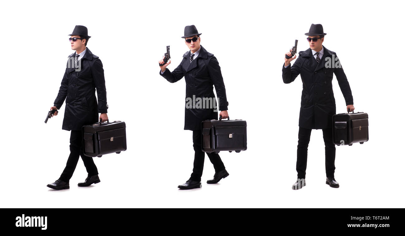 Man spy with handgun isolated on white background Stock Photo - Alamy