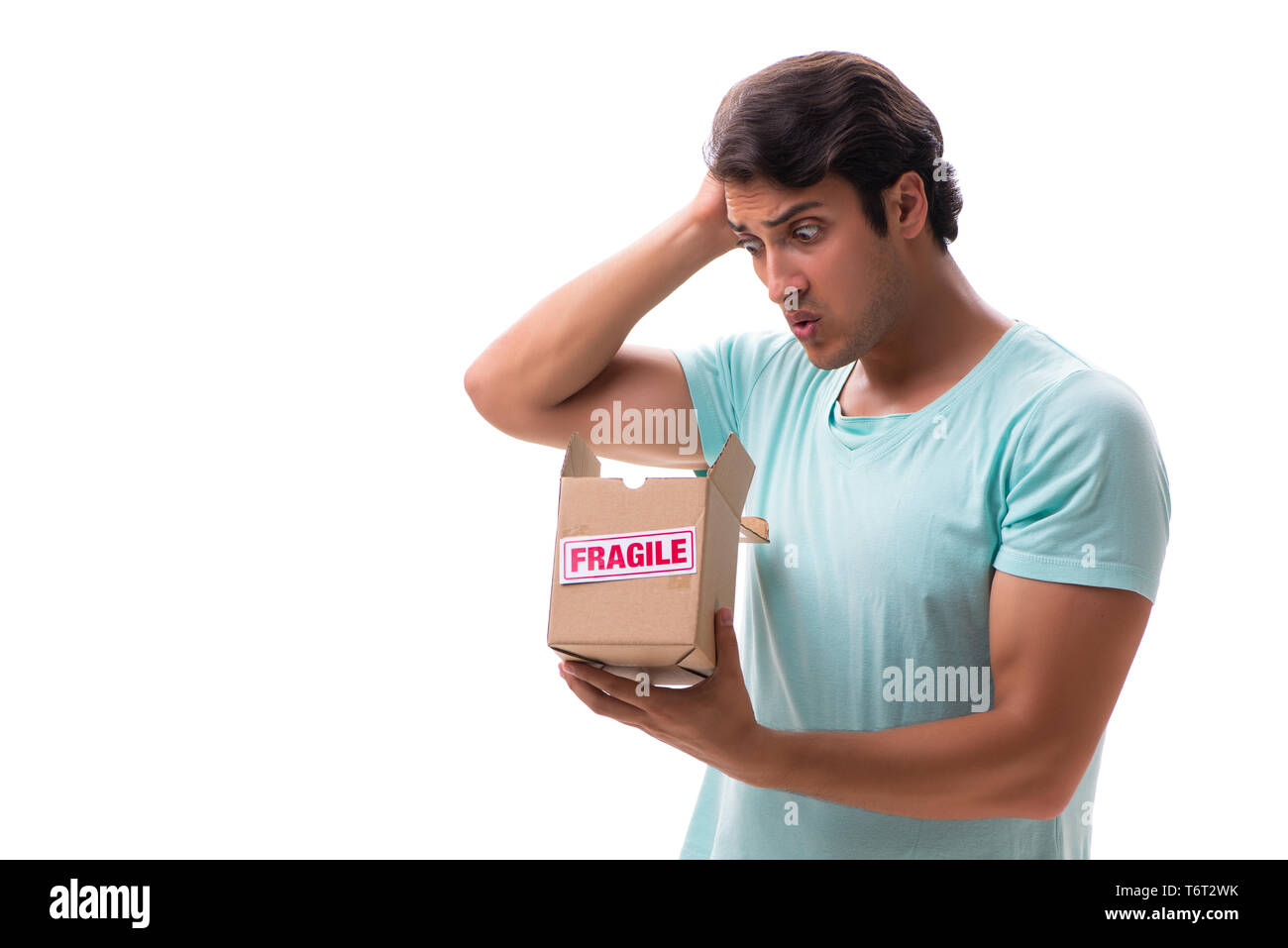 Shocked young man shopping Cut Out Stock Images & Pictures - Alamy