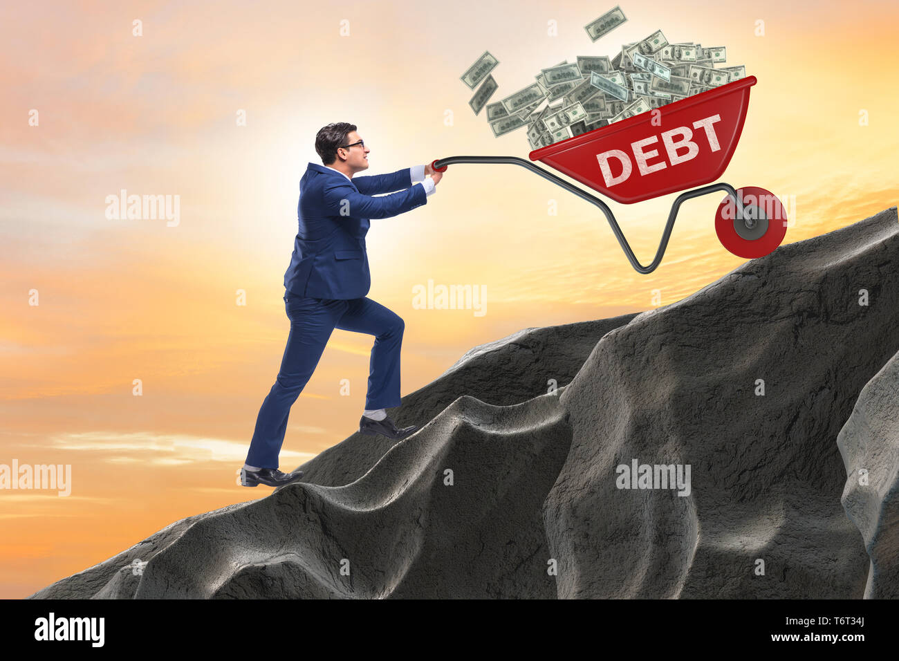 Man pushing rock uphill hi-res stock photography and images - Alamy